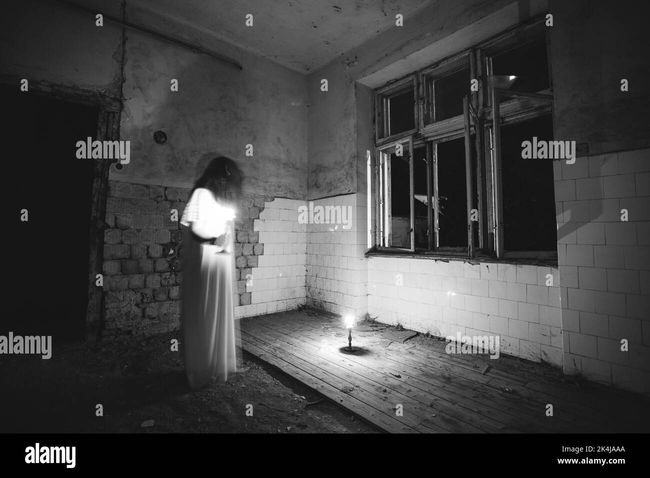 Ghost in abandoned, haunted house at night. Horror scene of scary ...