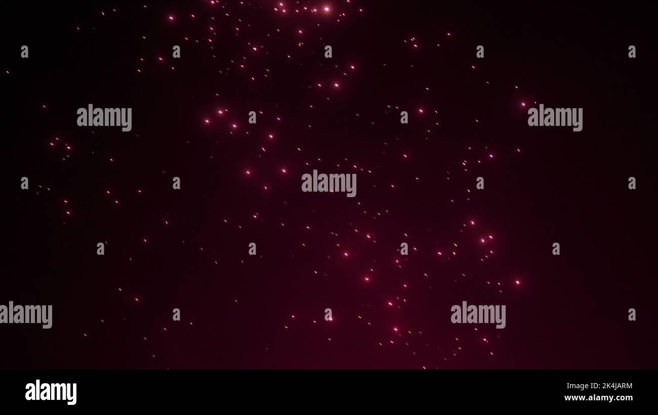 Pink red night fireworks bright sparkles and shiny festival explosion ...