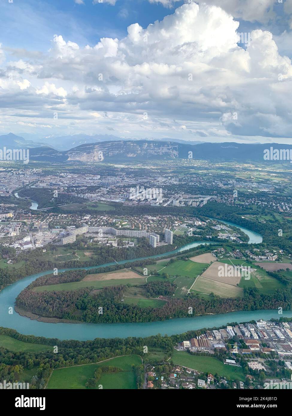 A bird's eye view of a river flowing through the city of Geneva in ...