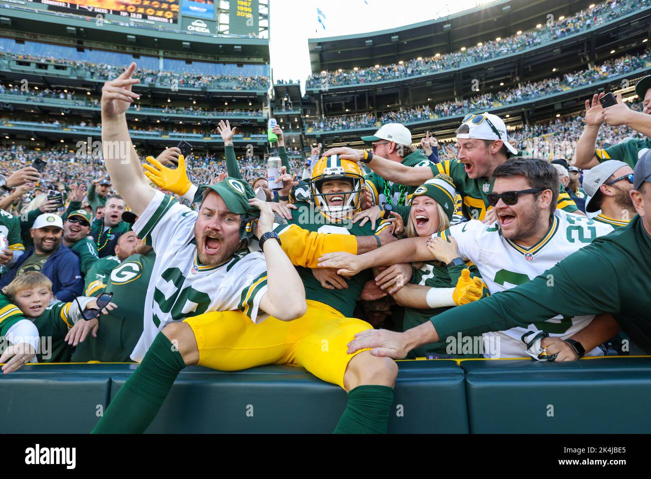 October 2, 2022: Green Bay Packers wide receiver Christian Watson (9) Lambeau Leap during the ...