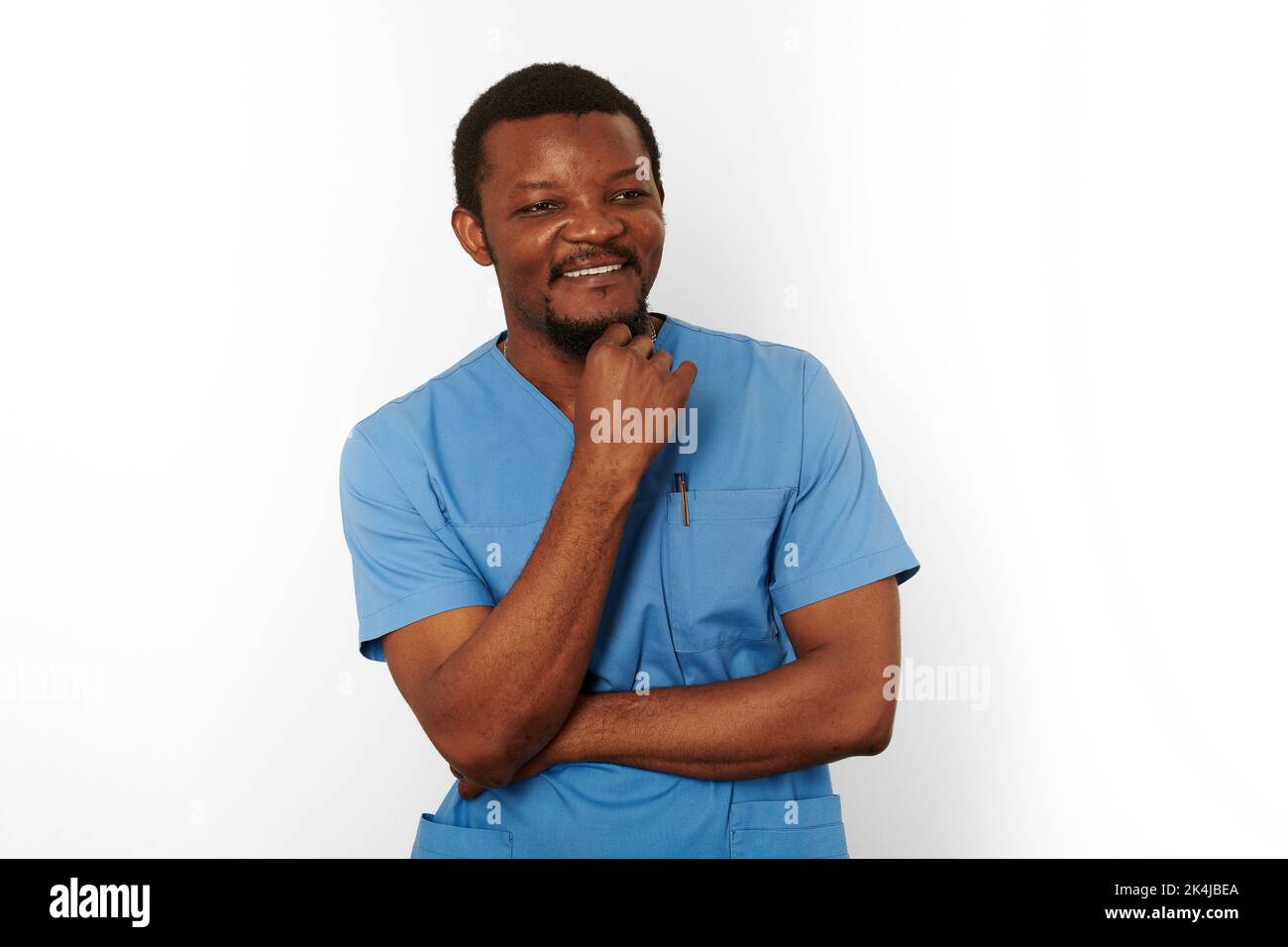 Smiling black surgeon doctor bearded man in blue coat with isolated on ...