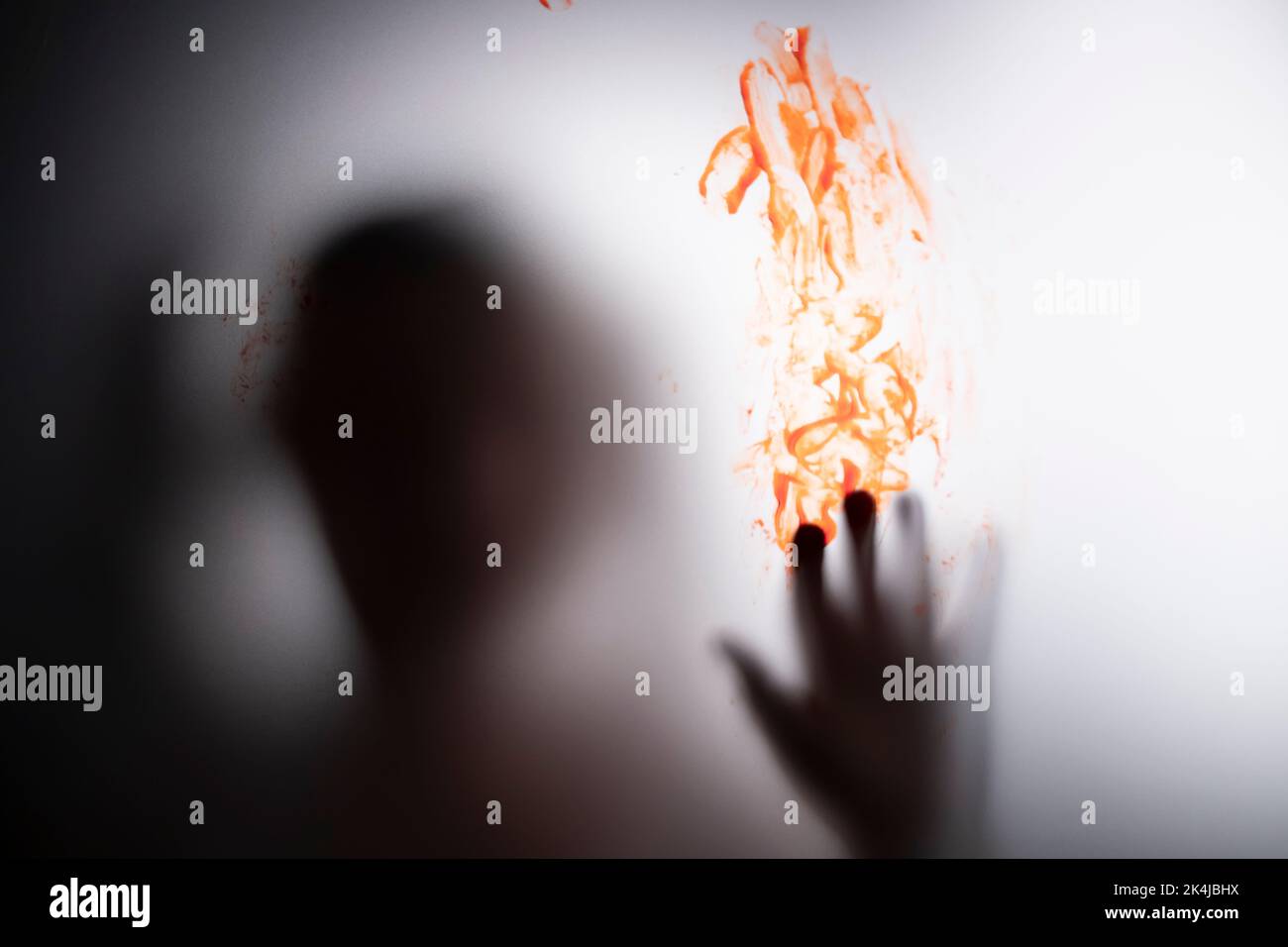 Child behind glass hand on glass hi-res stock photography and images ...