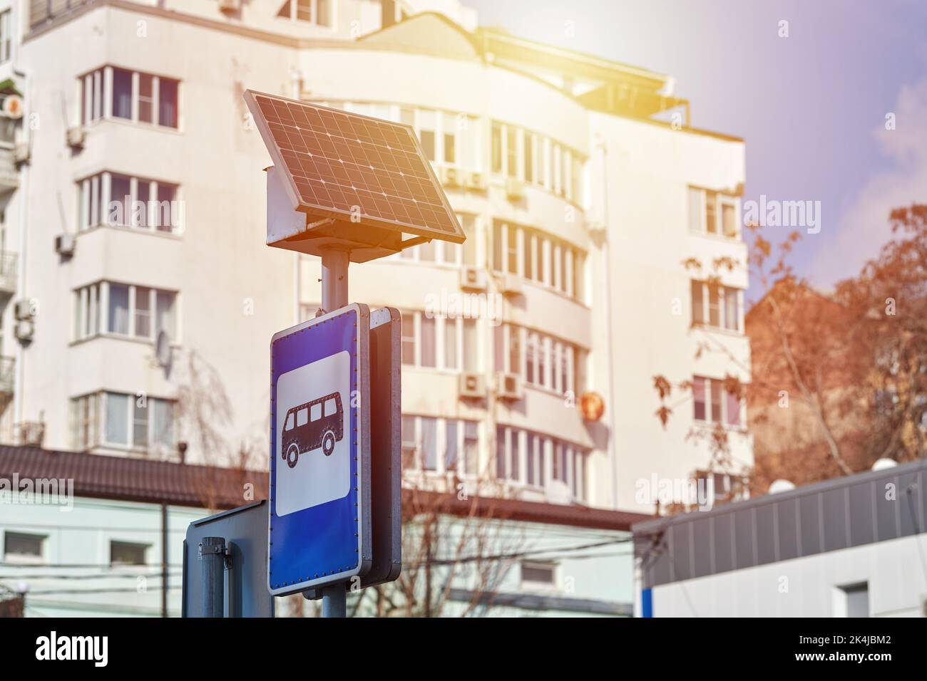 Solar panel on city road sign post, power for bus stop light ...
