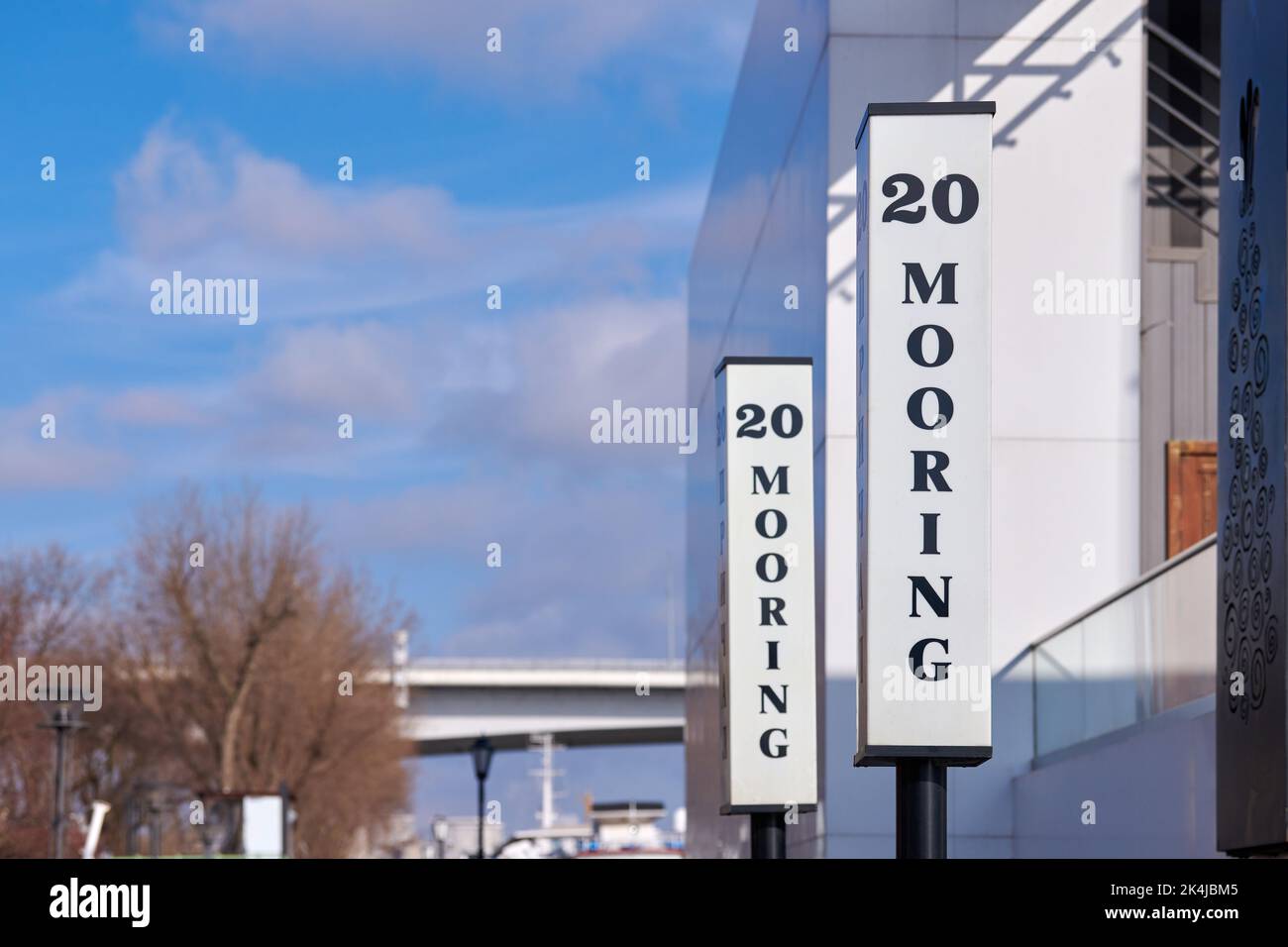 Mooring pier signs in city embankment, identification signs with ...