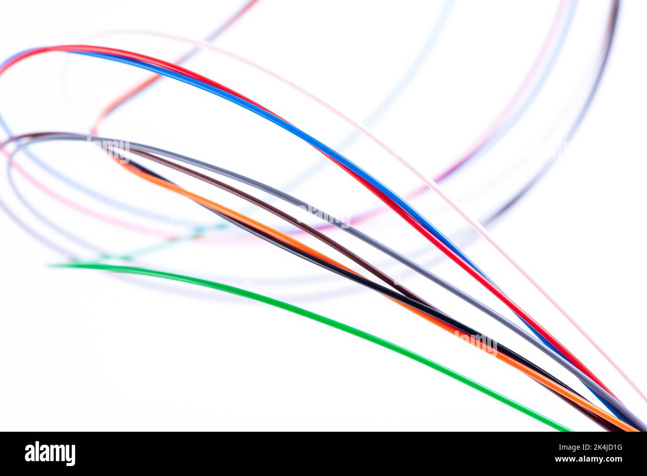Abstract curves, colorful electrical cable wire isolated on white ...
