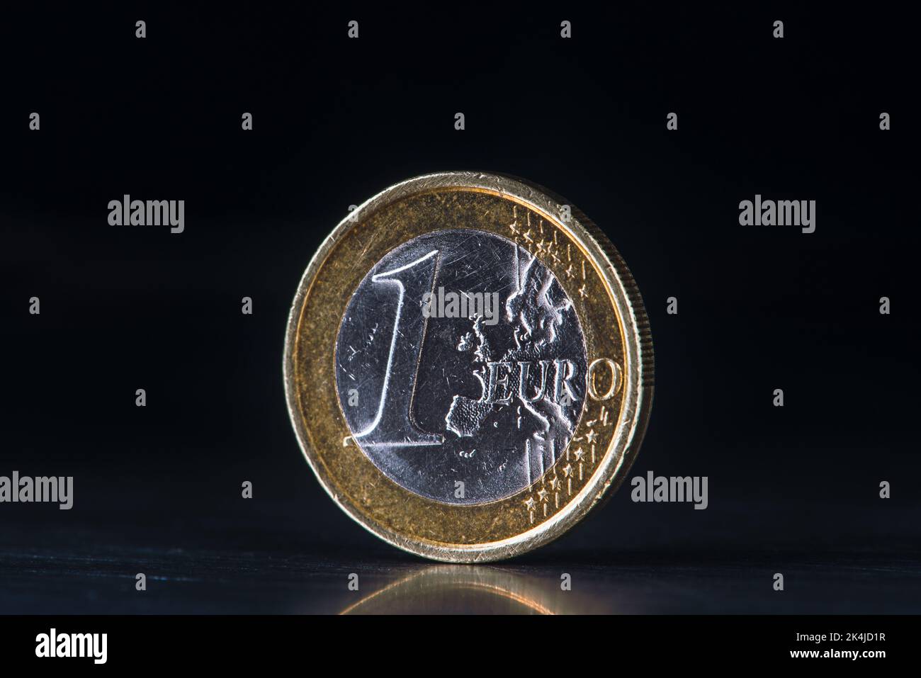 Old one euro coin stands on dark metallic background Stock Photo - Alamy