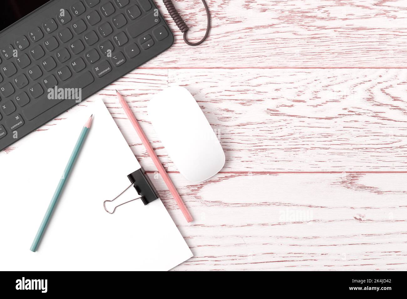 Toned desk image with laptop keyboard, office paper, computer mouse and ...