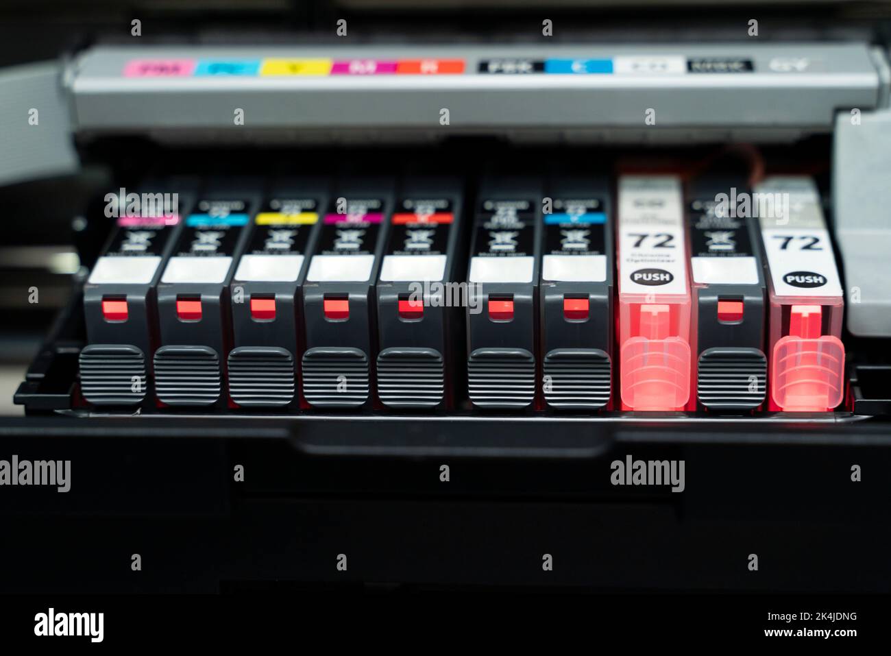 A stack of color printer cartridges Stock Photo - Alamy