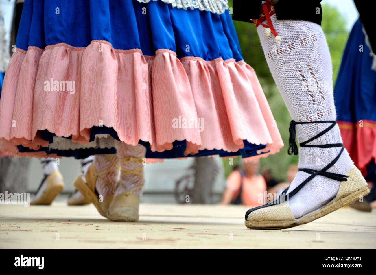 Folkloric dance. Men and women dancing in traditional costumes Stock ...