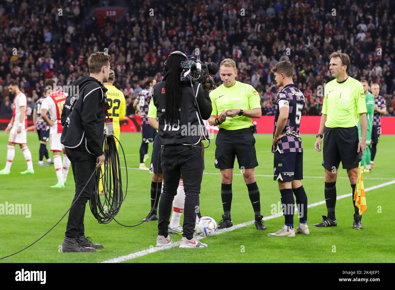 AMSTERDAM, NETHERLANDS - OCTOBER 1: referee Alex Bos, Bas Kuipers of Go ...