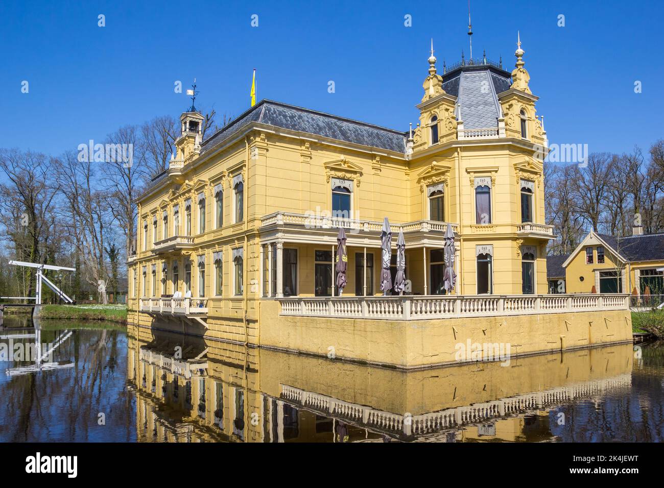 Historic mansion Nienoord in the pond in Leek, Netherlands Stock Photo ...