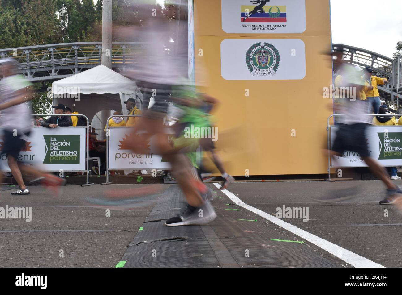 Athletes cross the finish line during the comeback after two years of ...