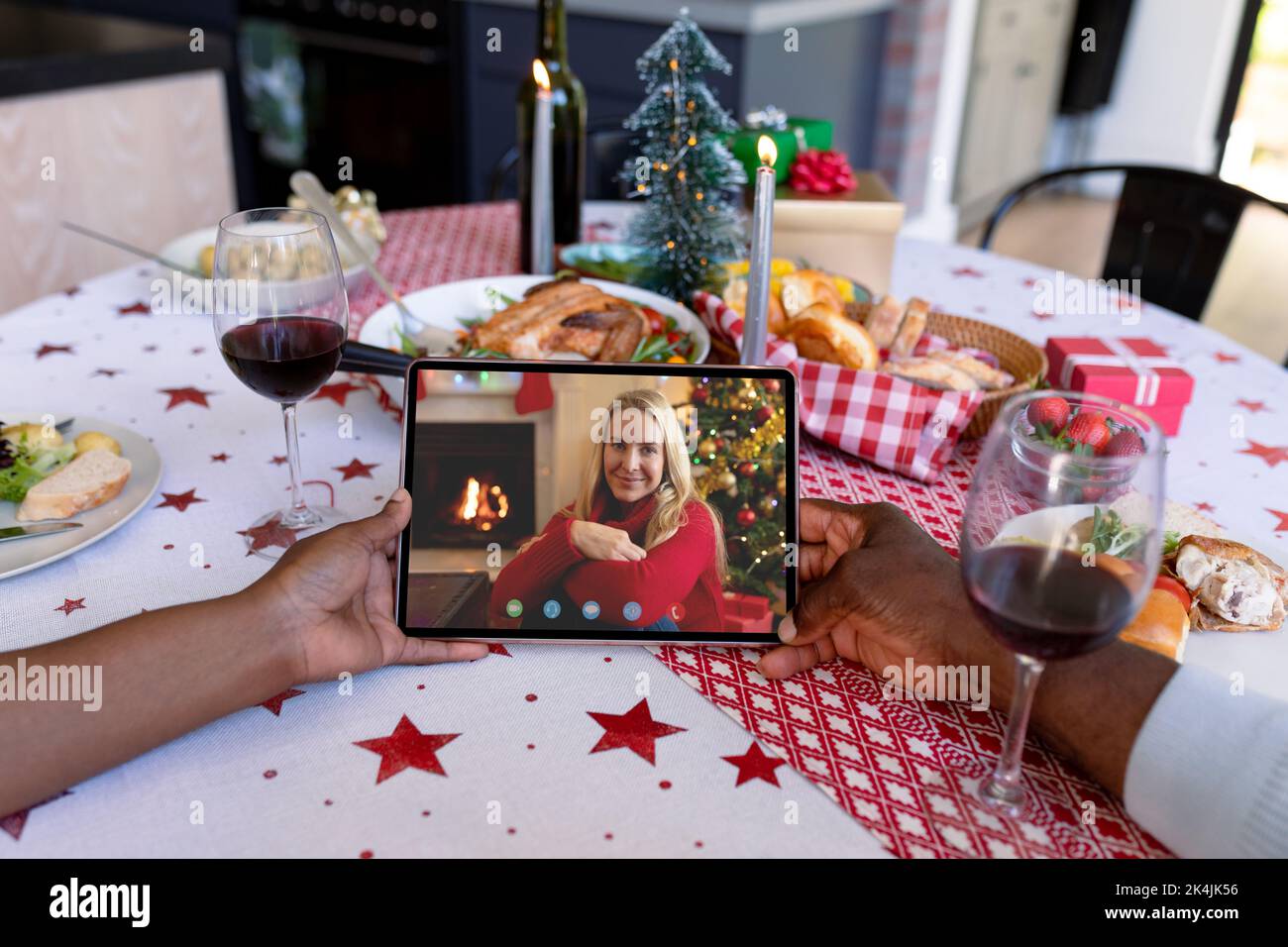 African american couple making tablet christmas video call with smiling ...