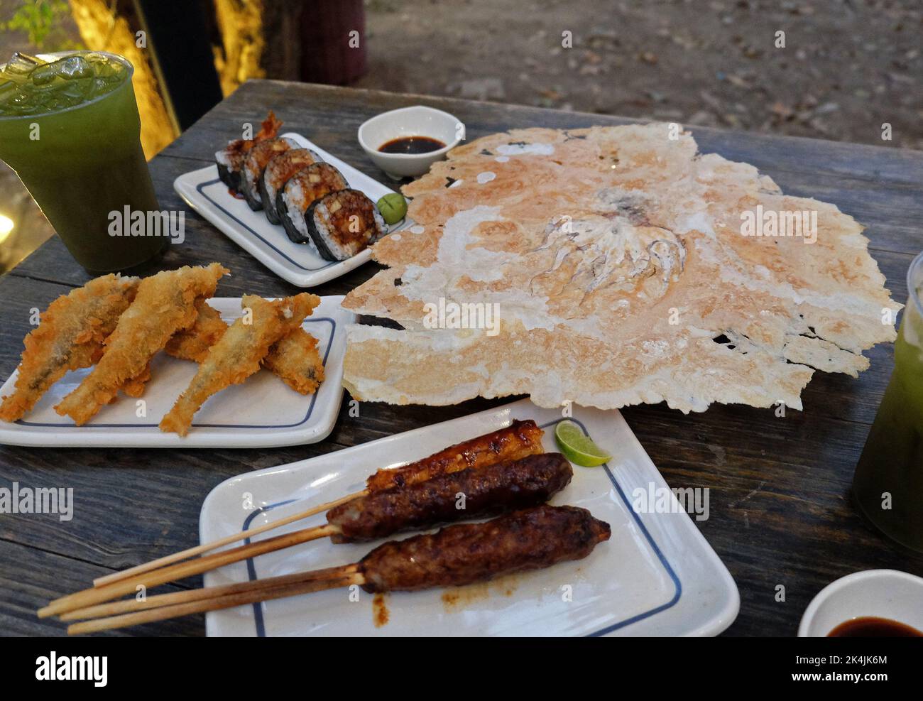 Izakaya(Japanese style street food) Chicken teriyaki skewers, deep ...