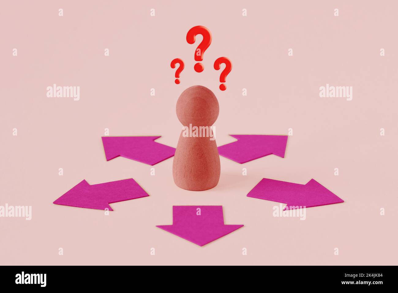 Pink pawn with arrows choosing the best way - Concept of women and ...