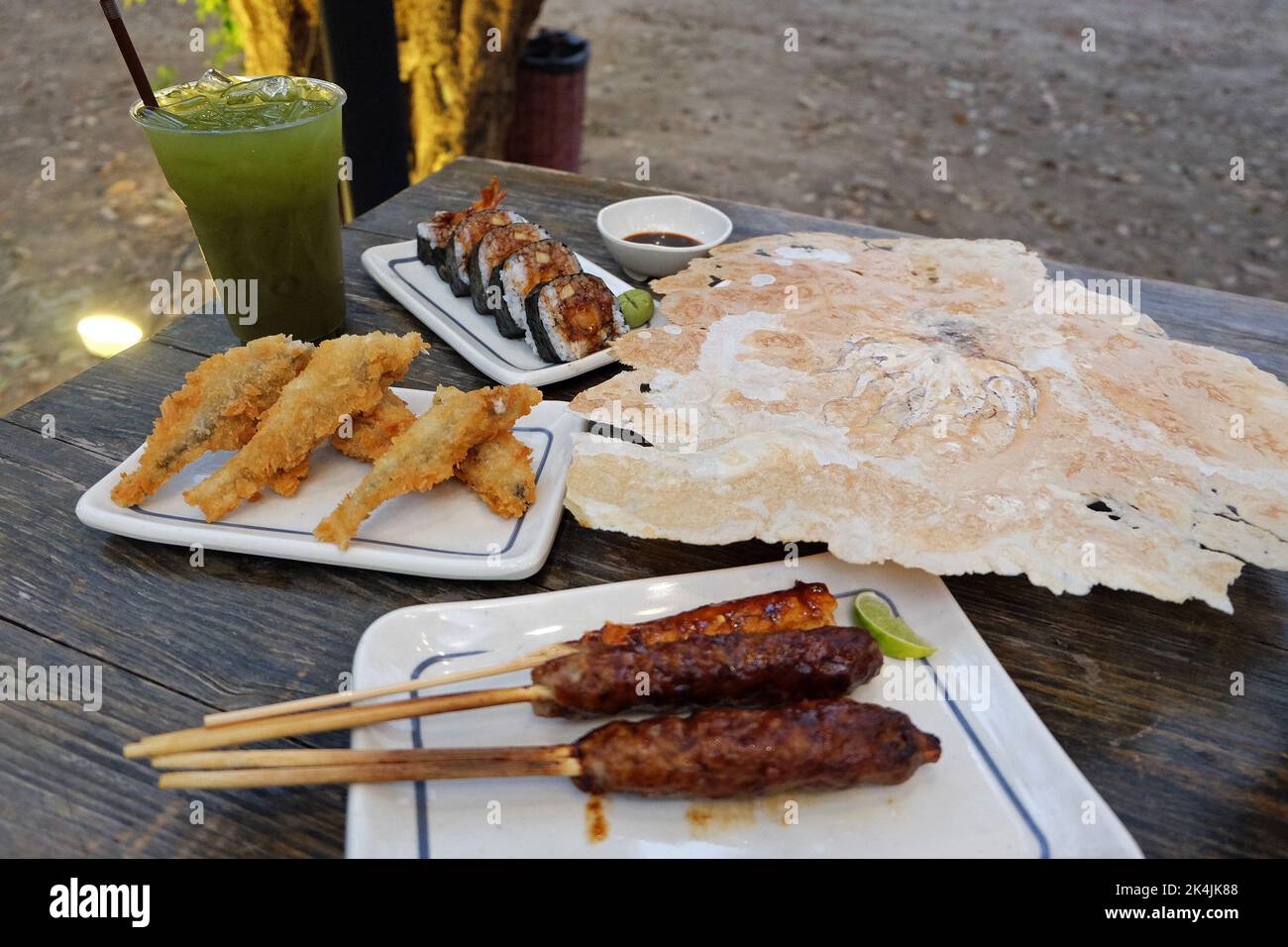 Izakaya(Japanese style street food) Chicken teriyaki skewers, deep ...