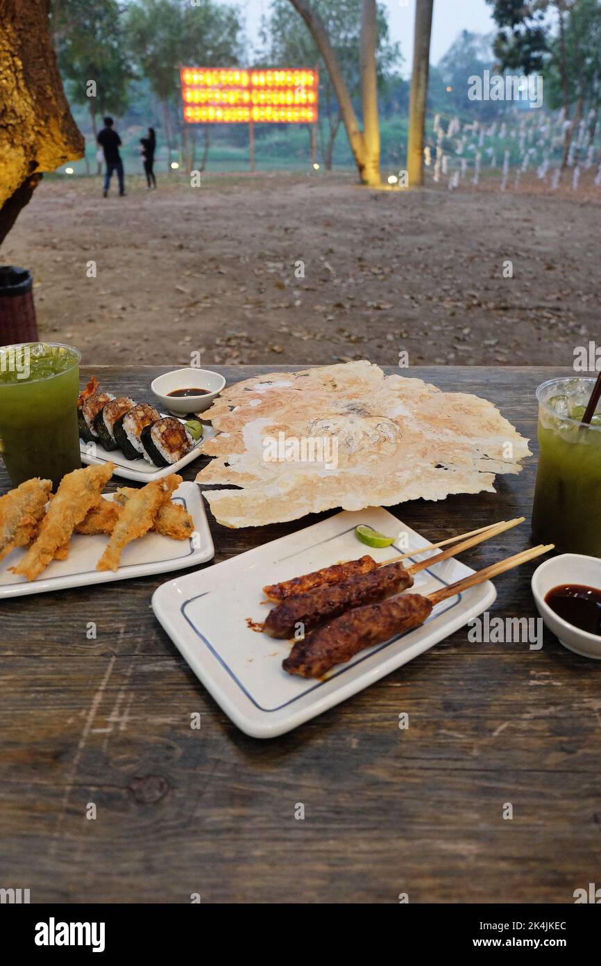 Izakaya(Japanese style street food) Chicken teriyaki skewers, deep ...