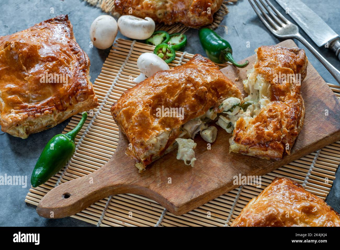 Mini chicken and mushroom puff pastry pies Stock Photo - Alamy
