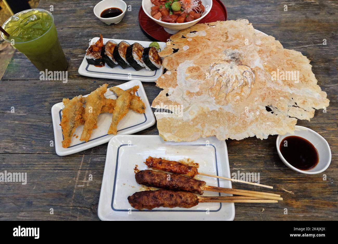Izakaya(Japanese style street food) Chicken teriyaki skewers, deep ...