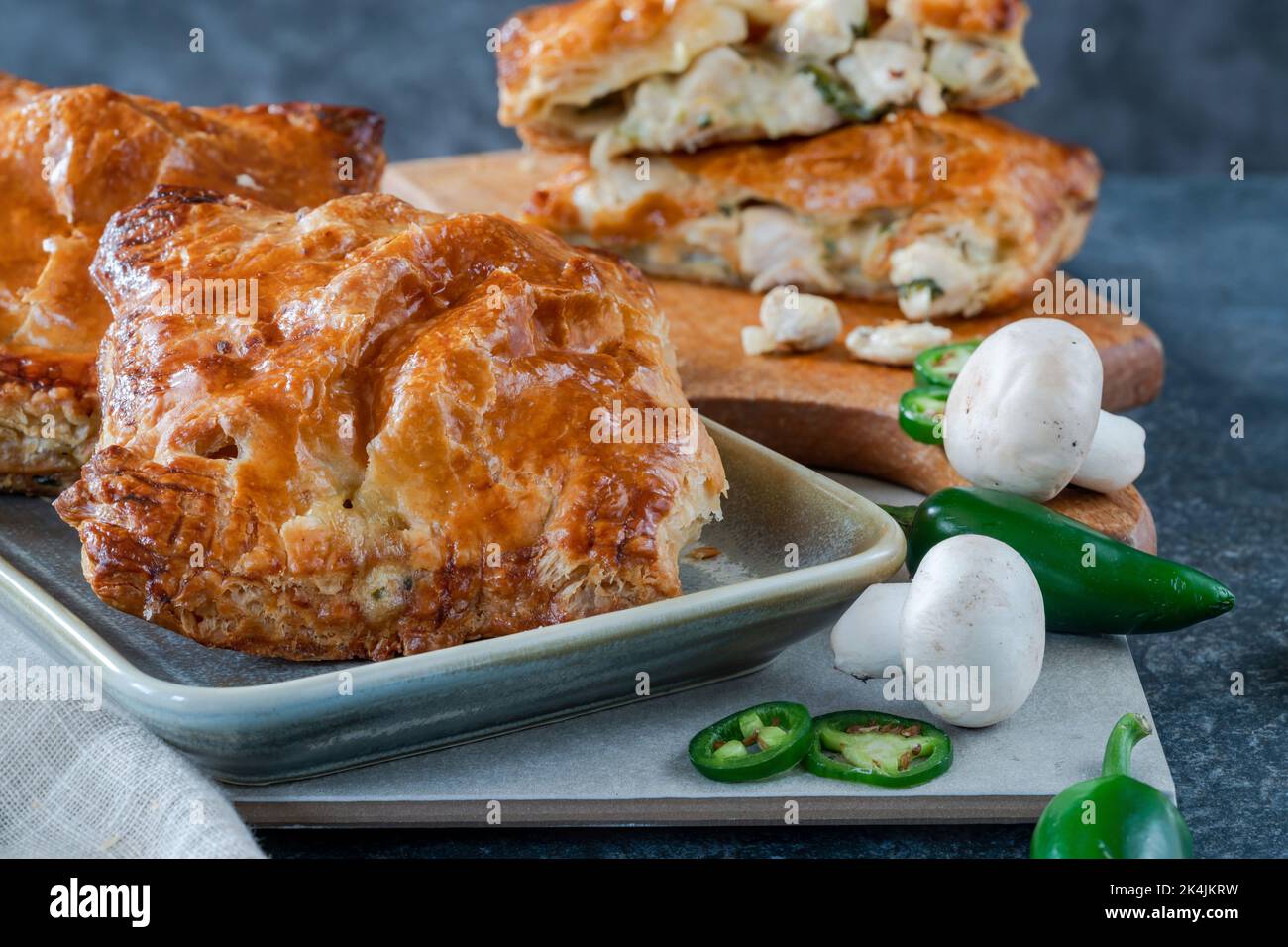 Mini chicken and mushroom puff pastry pies Stock Photo - Alamy