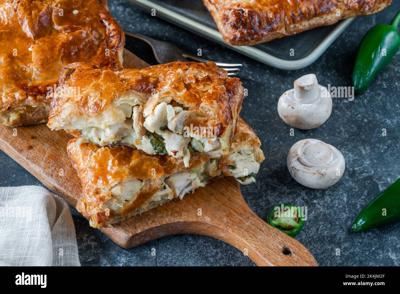 Mini chicken and mushroom puff pastry pies Stock Photo - Alamy