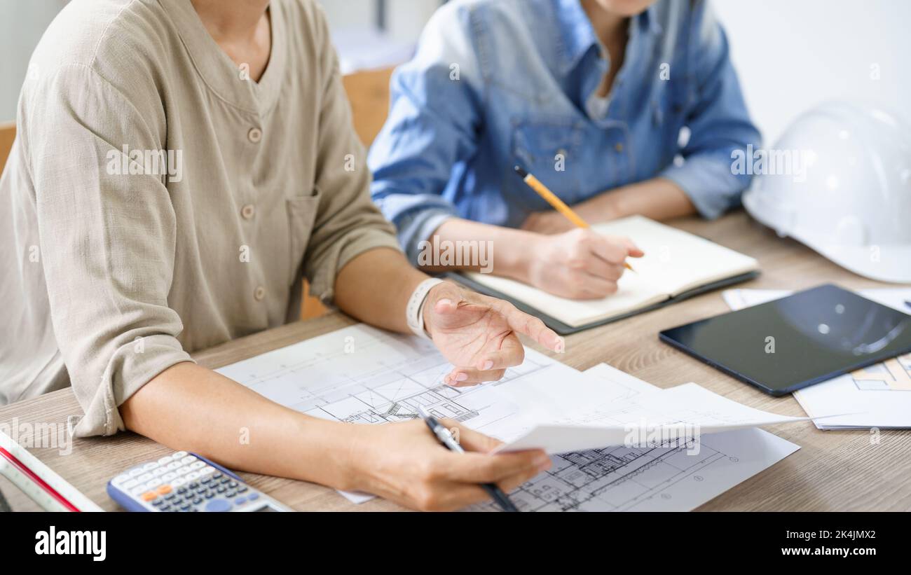 Engineering construction concept, Two female engineers is discussing ...