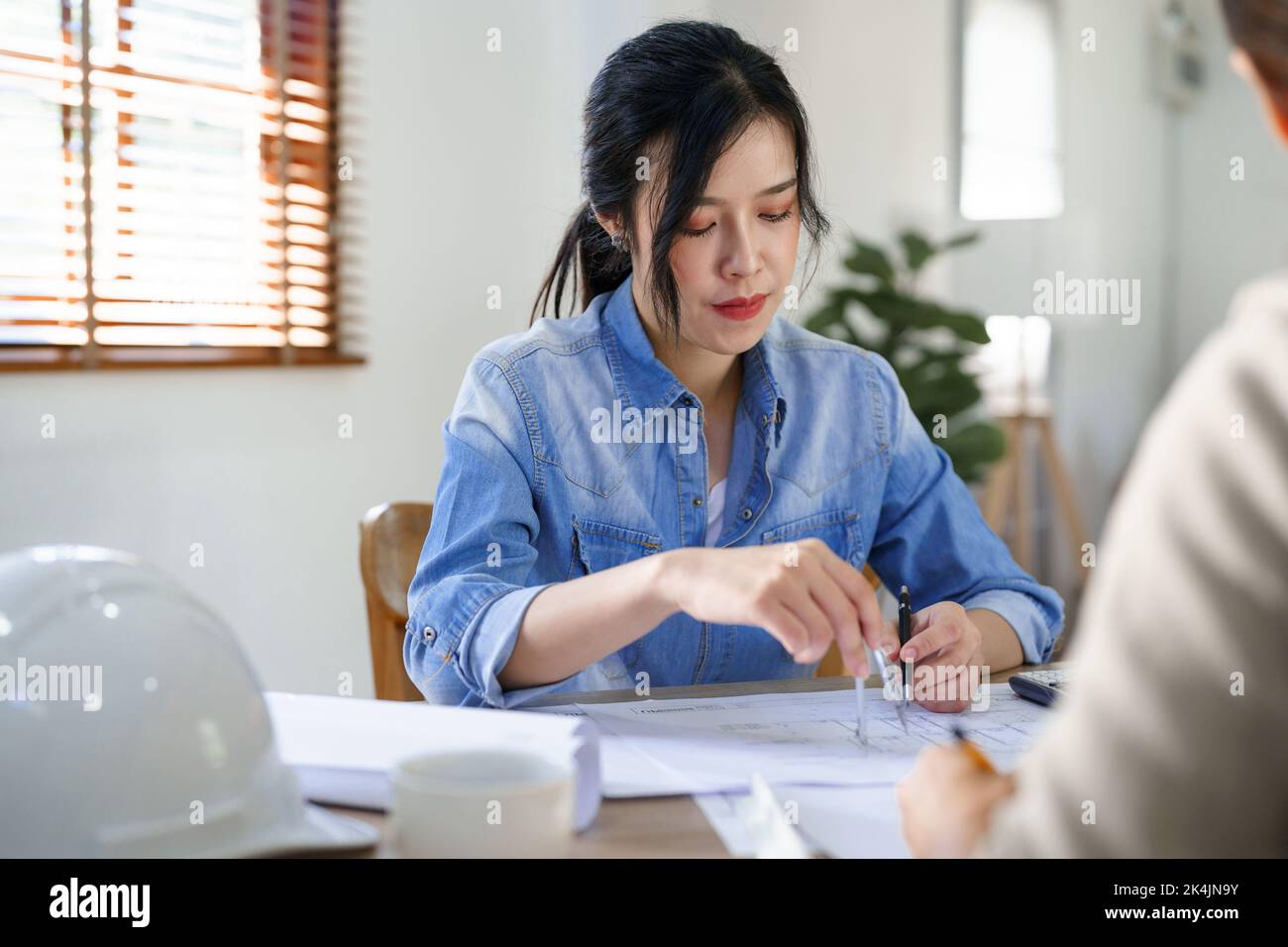 Concept of engineering consulting, Two female engineers brainstorming ...