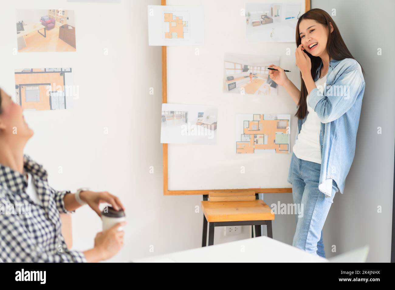 Construction business plan concept, Female architect explaining house ...