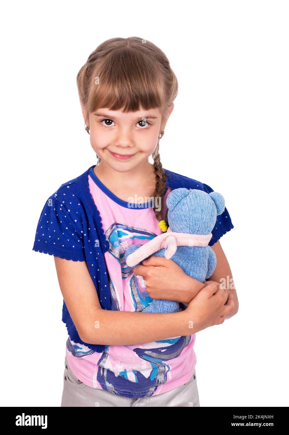 Little girl holding a teddy bear. Isolated on white background. Girl hugging two teddybears ...