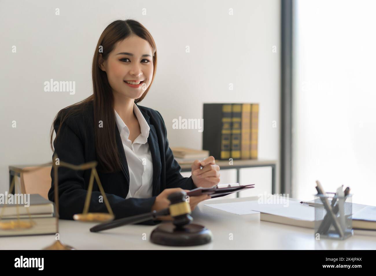 Legal and justice concept, Female lawyer writing contract about ...