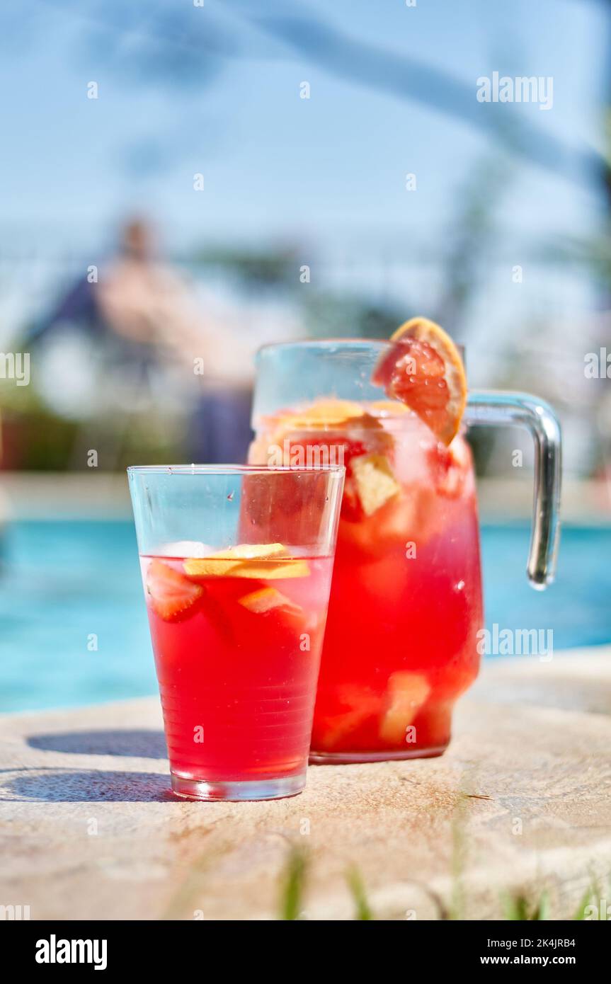 fruit cocktails by the pool Stock Photo - Alamy