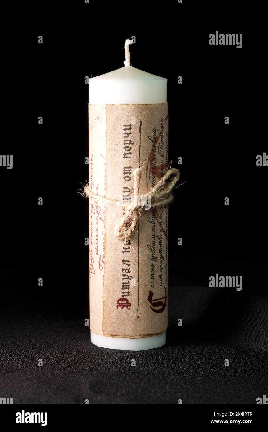 The magic candle on a colored background Stock Photo - Alamy