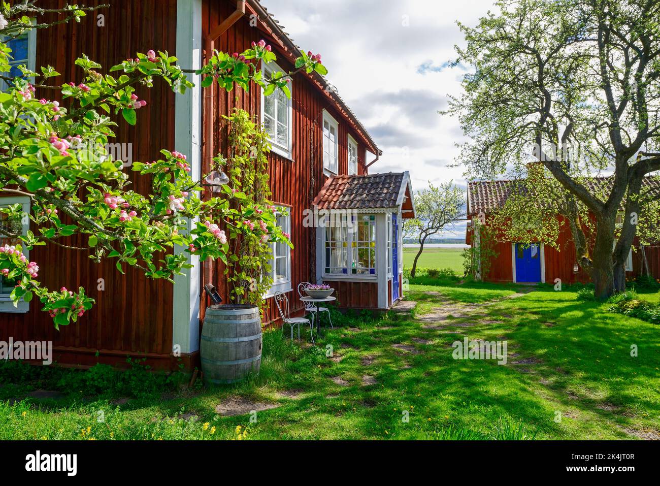 A falu-red dwelling-house with a porch and garden in front, Sörmland ...