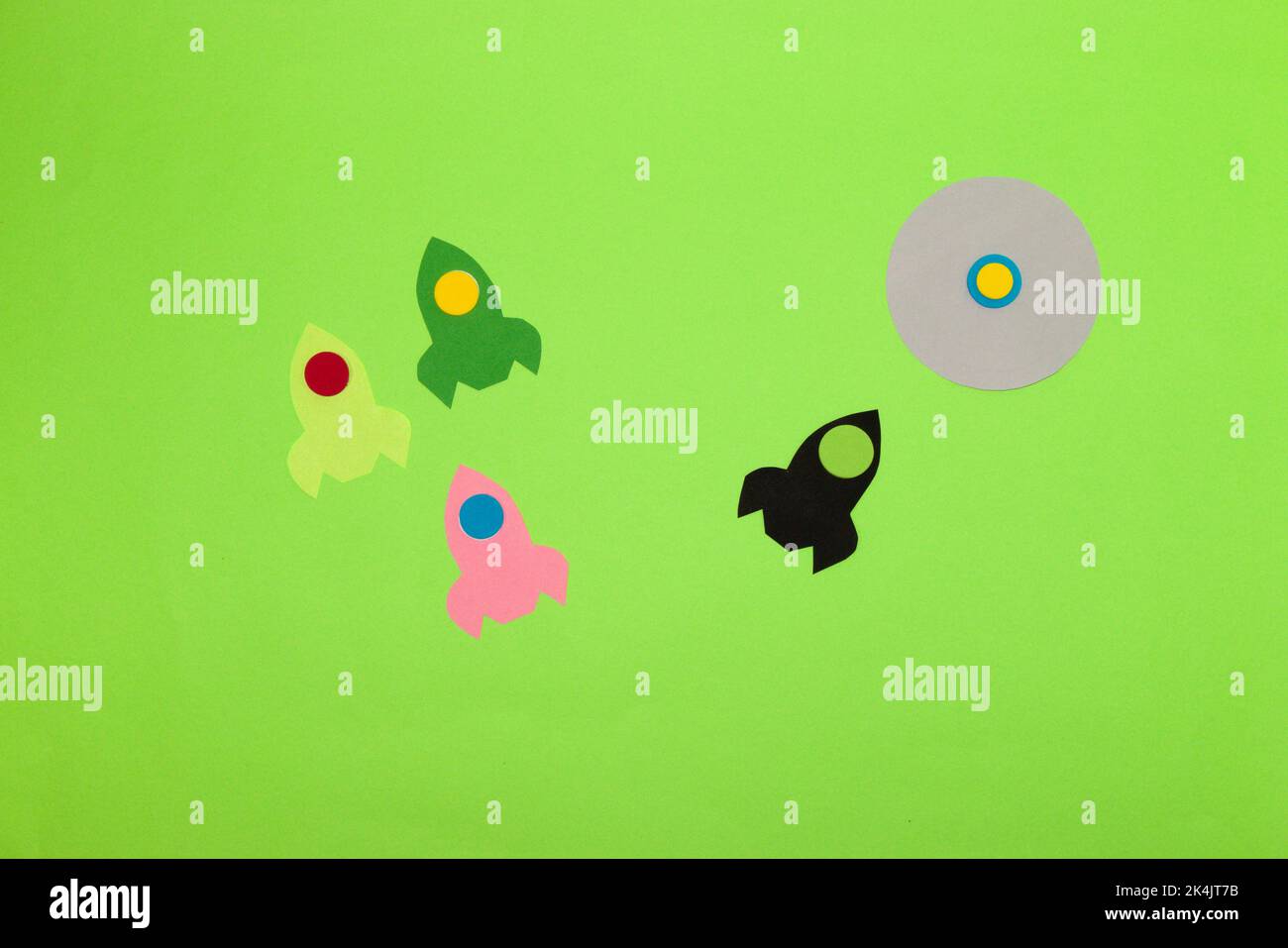 colorful rockets fly in one direction, one rocket stands out and flies ...