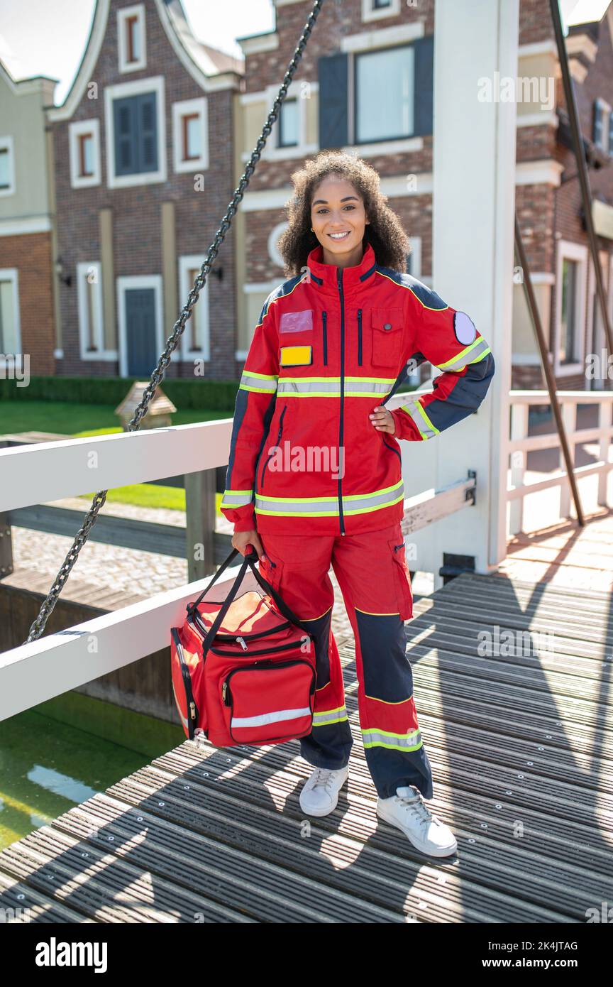 Cheerful paramedic posing for the camera outdoors Stock Photo - Alamy