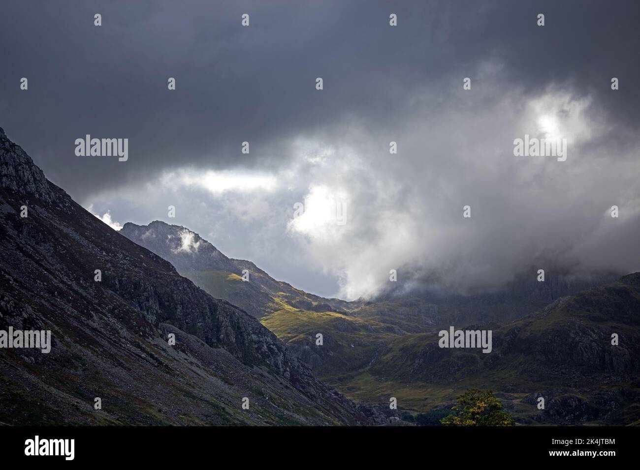 Snowdonia under heavy rain clouds looking towards Tryfan from Nant ...