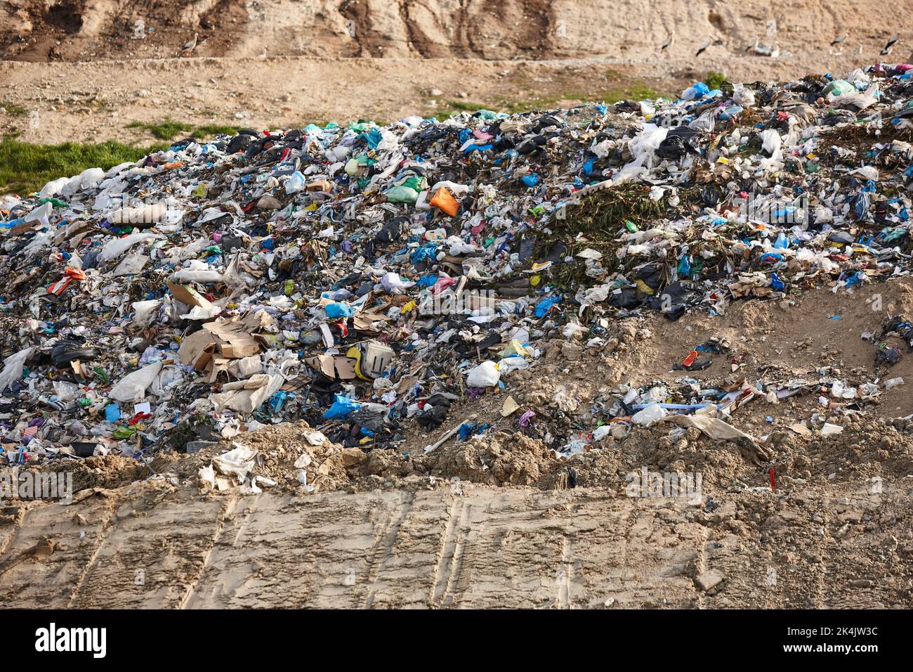 Open air garbage dump. Plastic pollution. Recycling junk. Consumerism ...
