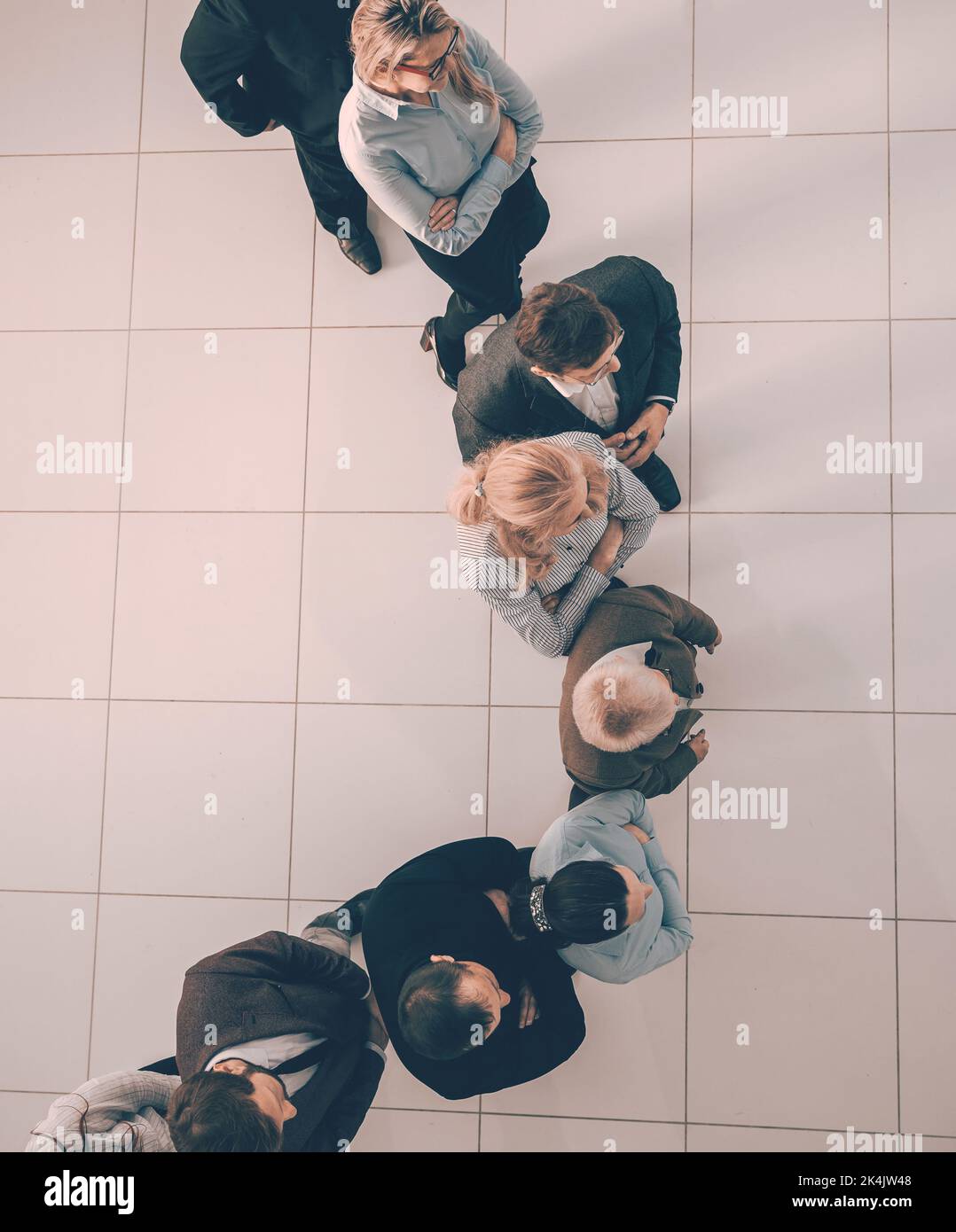 top view. business leader standing ahead of his colleagues Stock Photo ...