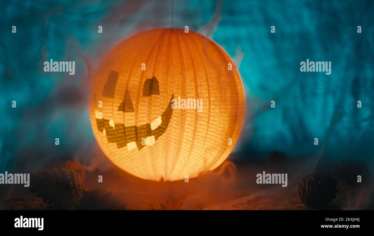 Scary Halloween lantern among the cobwebs Stock Photo - Alamy