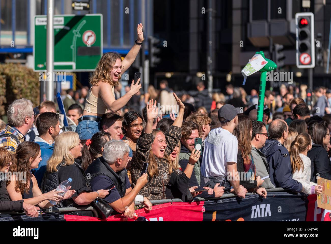Crowd cheering on fun runners running in the TCS London Marathon 2022 ...
