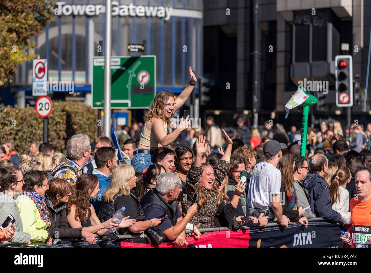 Crowd cheering on fun runners running in the TCS London Marathon 2022 ...