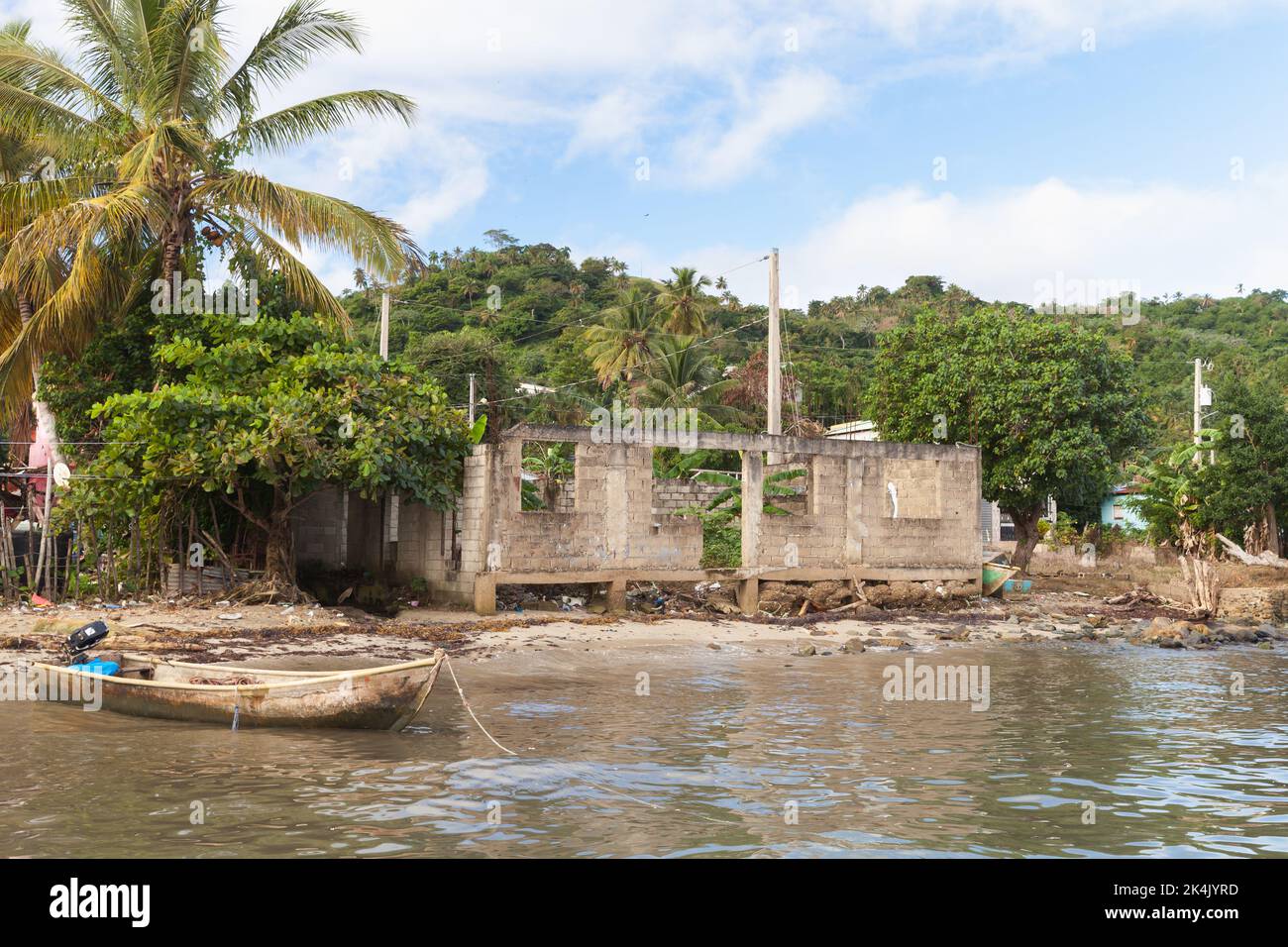 Old motor boat is moored at Samana bay coast, Dominican Republic Stock ...