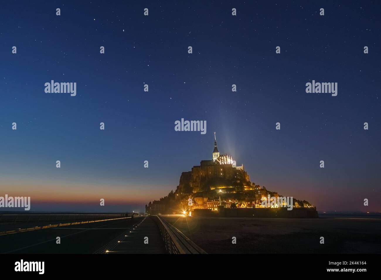 Night sky over le Mont Saint-Michel during twilight after sunset with ...