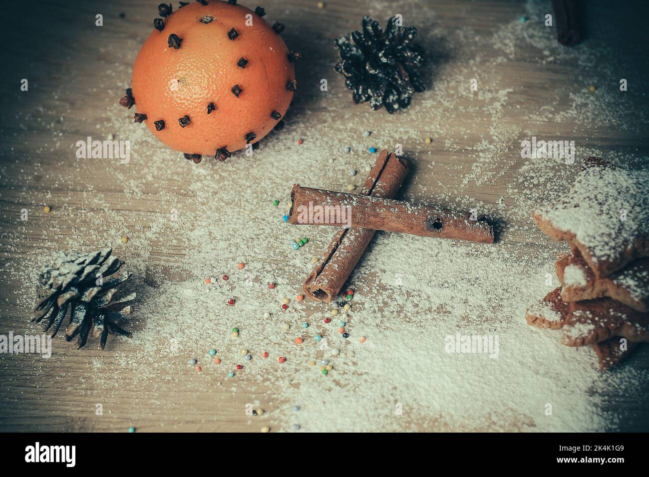 Christmas table. background image of cinnamon sticks,oranges an Stock ...