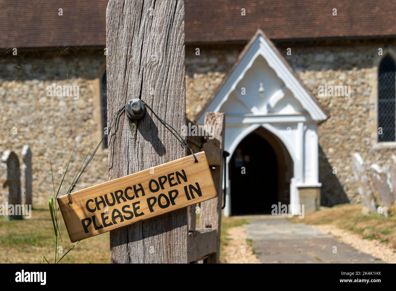 Sign outside a church saying 'church open please pop in' Stock Photo ...