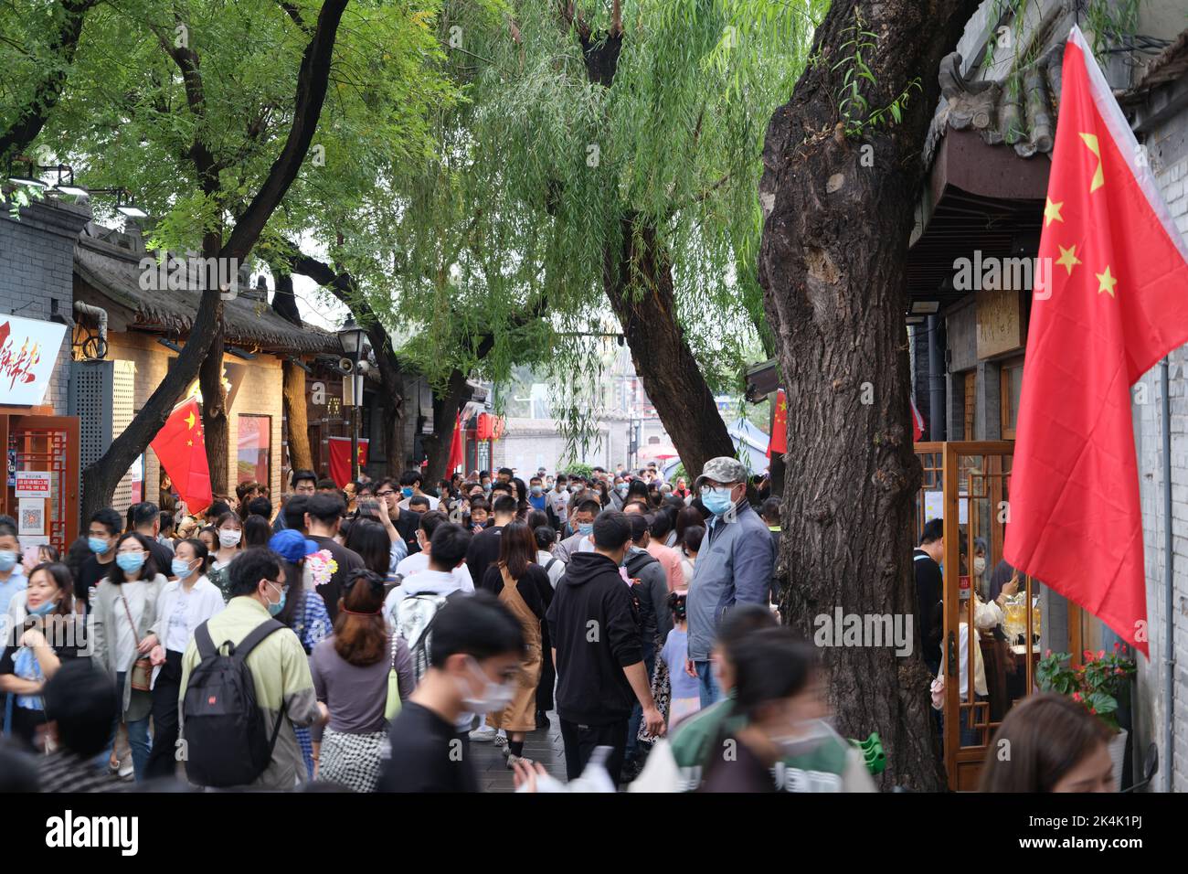 BEIJING, CHINA - OCTOBER 2, 2022 - Tourists visit South Luogu Lane in Beijing's Dongcheng ...
