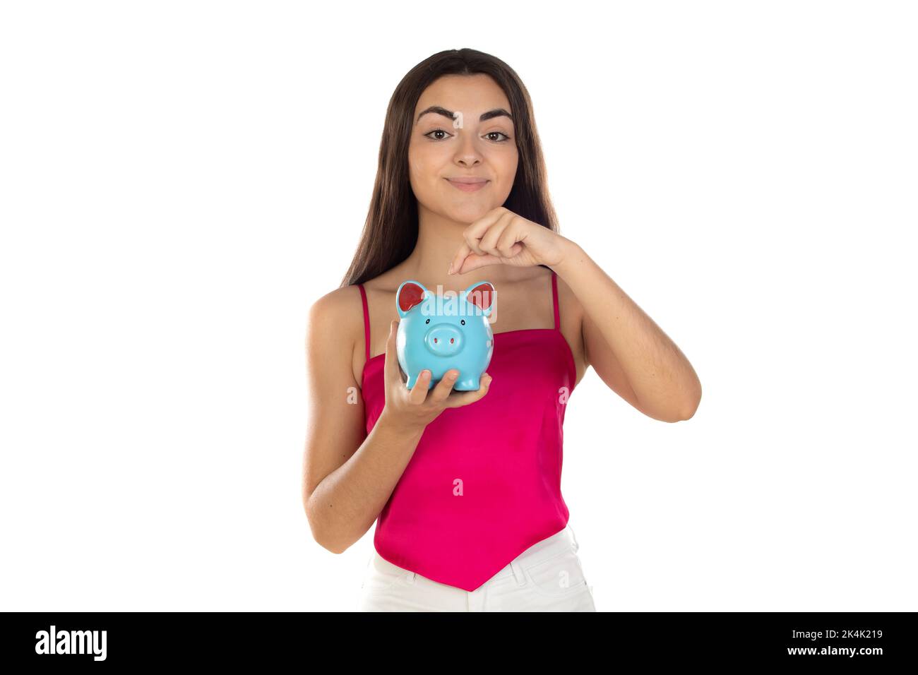 Young beautiful woman standing with piggy bank (money box), isolated on ...
