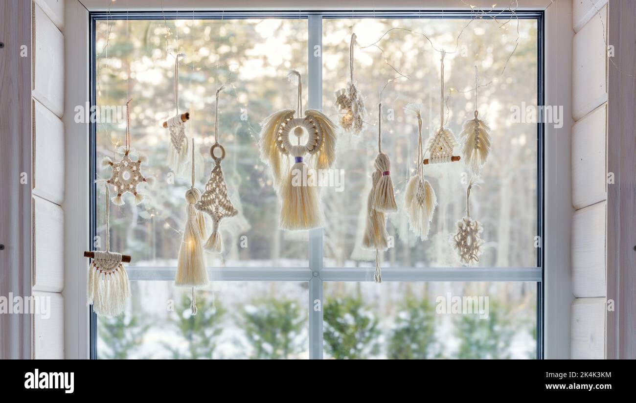 Christmas background, stylized angels on a winter window. Christmas ...