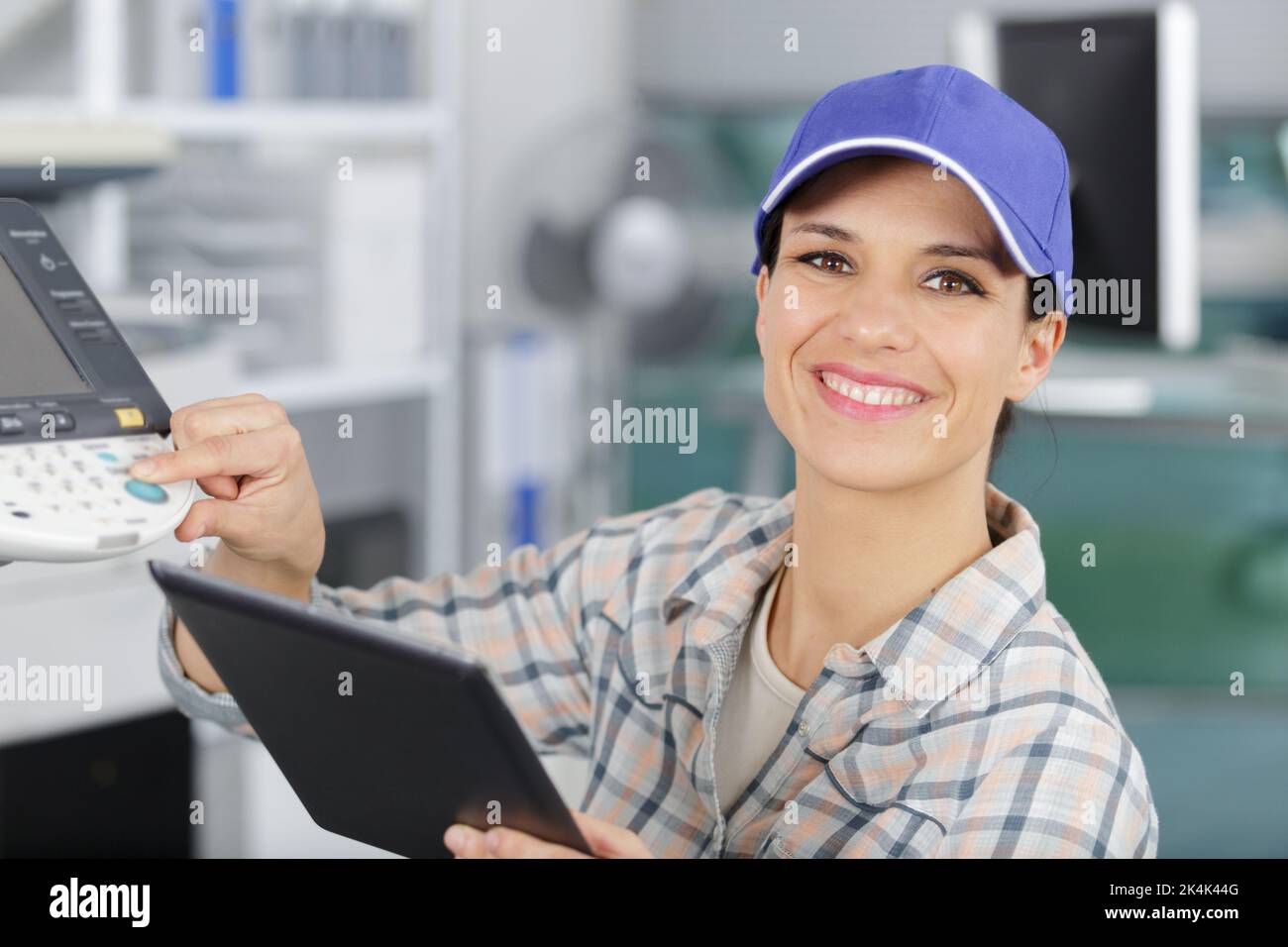 happy young woman on printer maintenance Stock Photo - Alamy