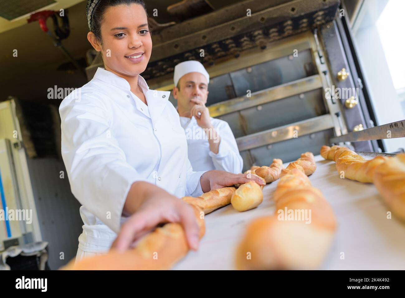 beautiful female bakery with various types of breads Stock Photo - Alamy